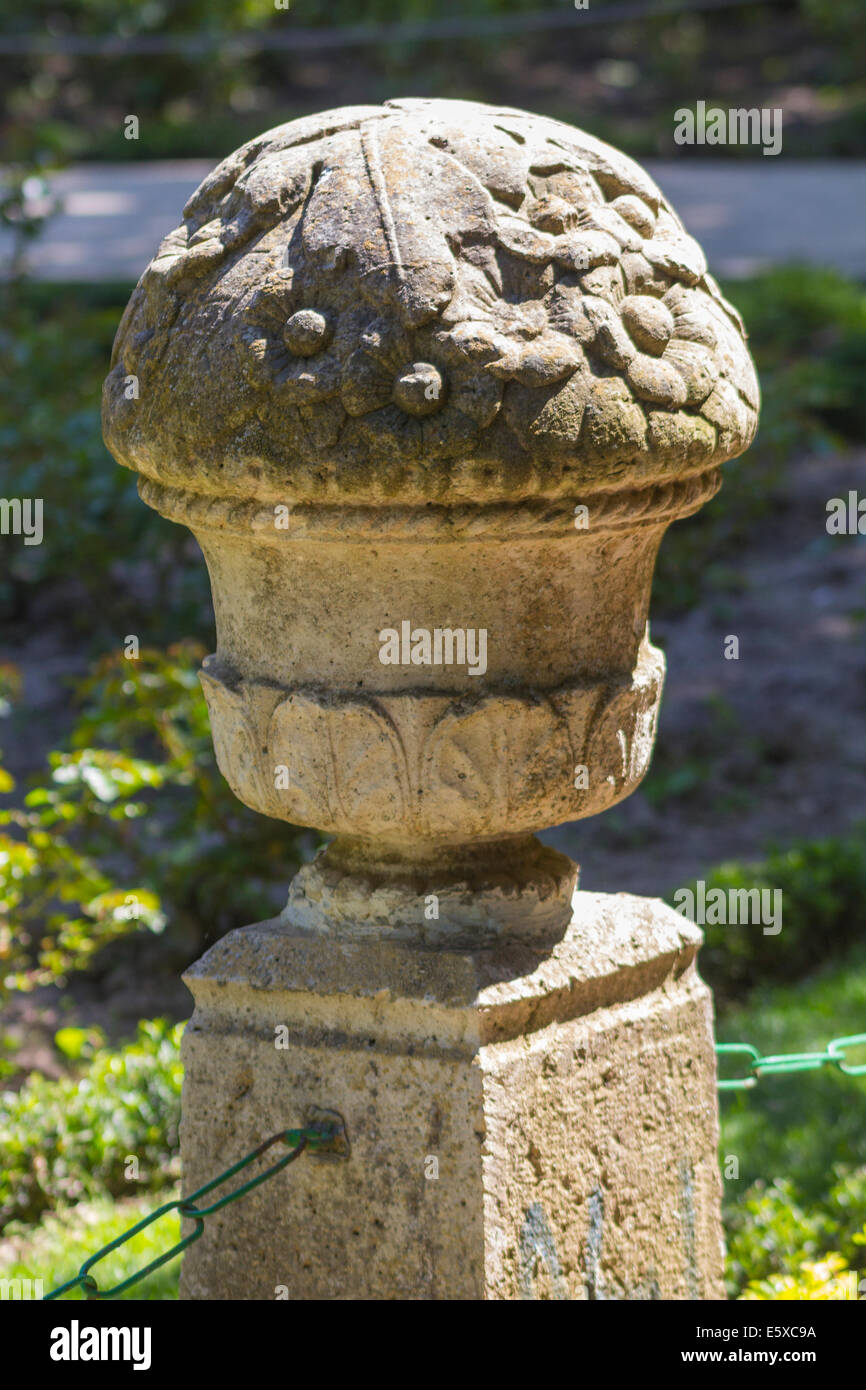 stone sculpture of a decorated vase Stock Photo - Alamy