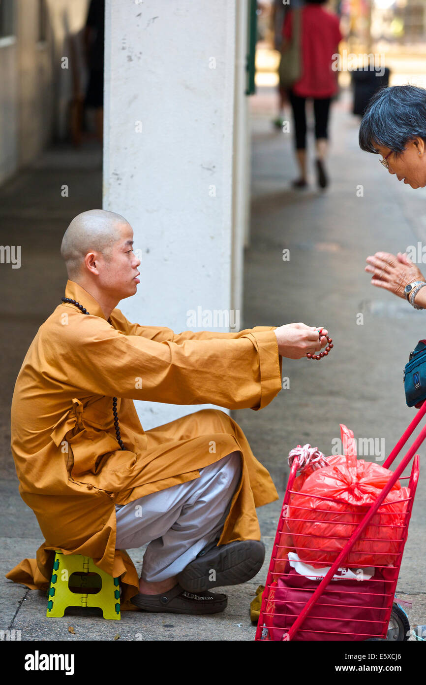 Monk hands in prayer High Resolution Stock Photography and Images - Alamy