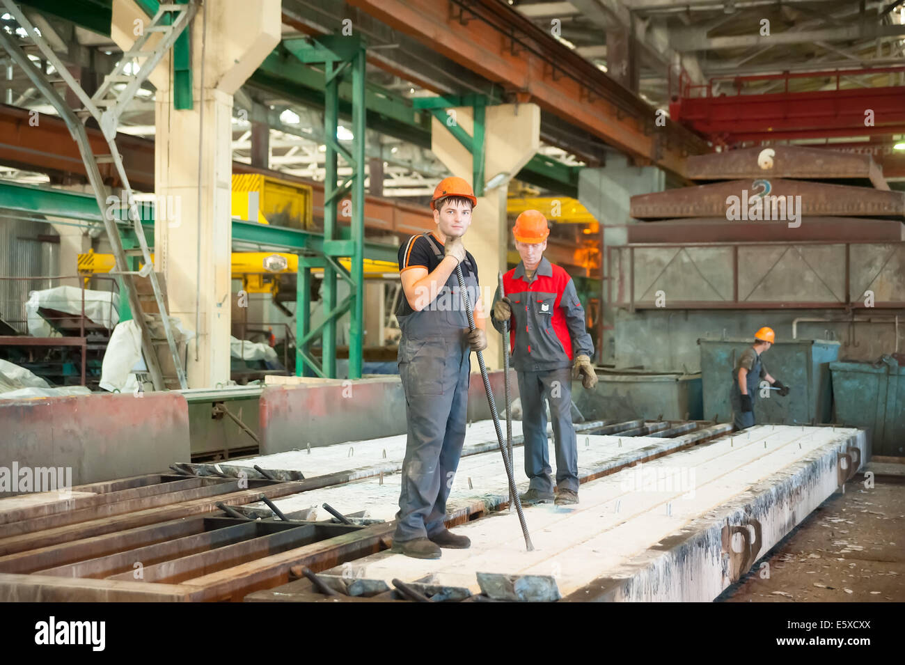 Workers in shop on production Stock Photo - Alamy