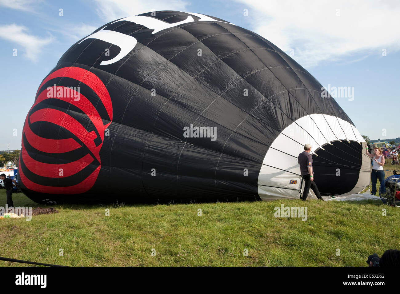 Bristol, UK. 7th August, 2014. The JLL balloon starts to inflate at the ...