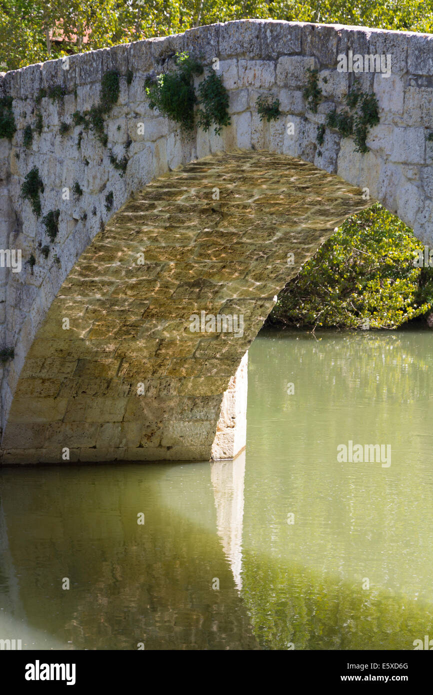 Old stone bridge block with arches and water Stock Photo - Alamy