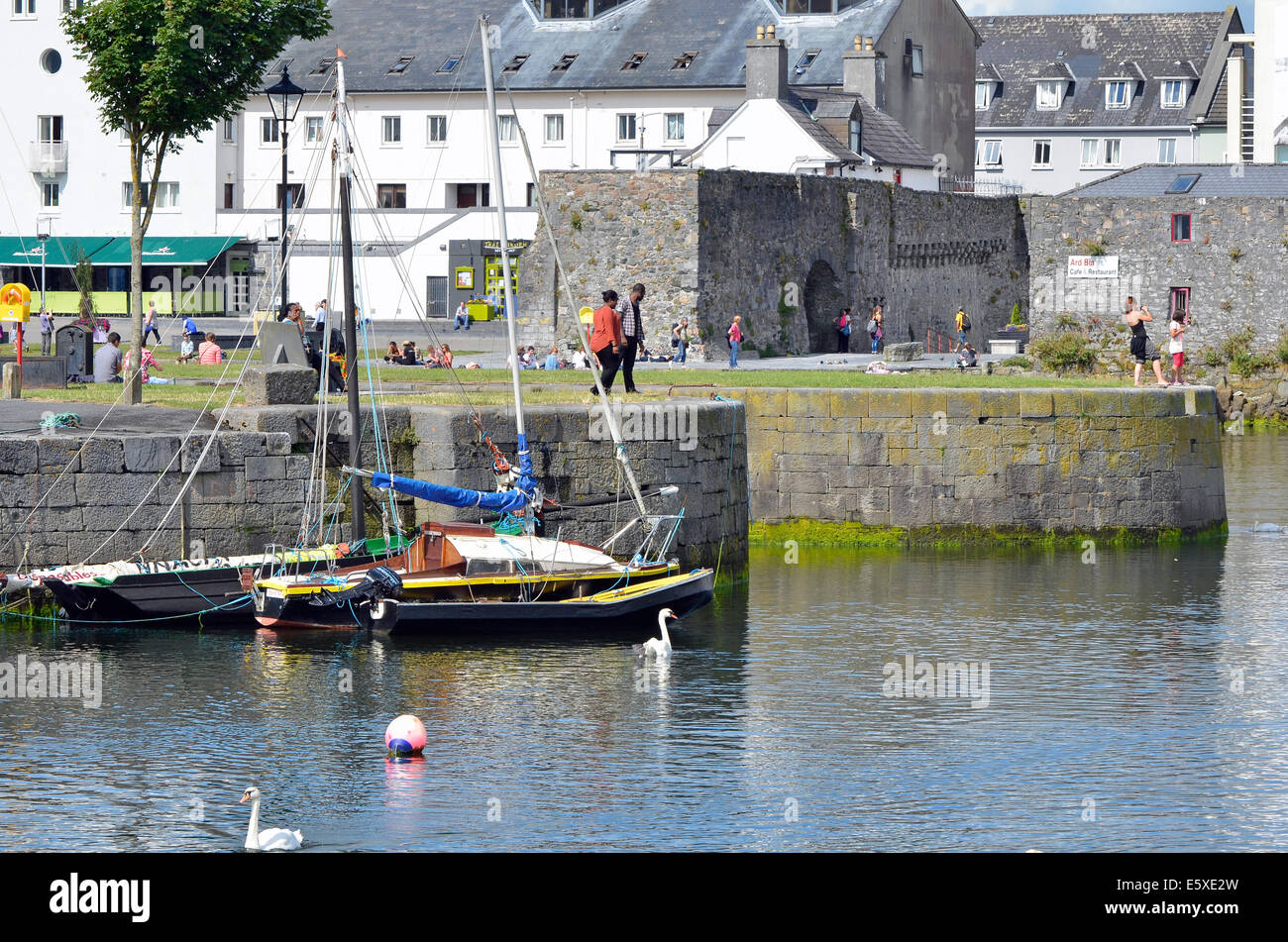 Pleasure boats moored in the Claddagh Basin, the old Galway town ...