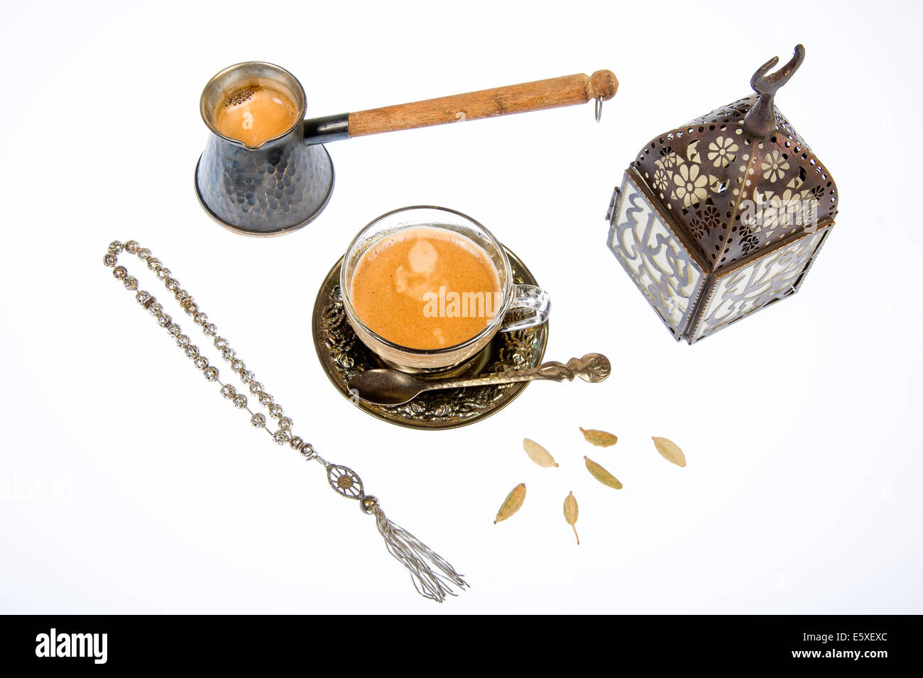 Arabic coffee with cardamom on a white background Stock Photo - Alamy
