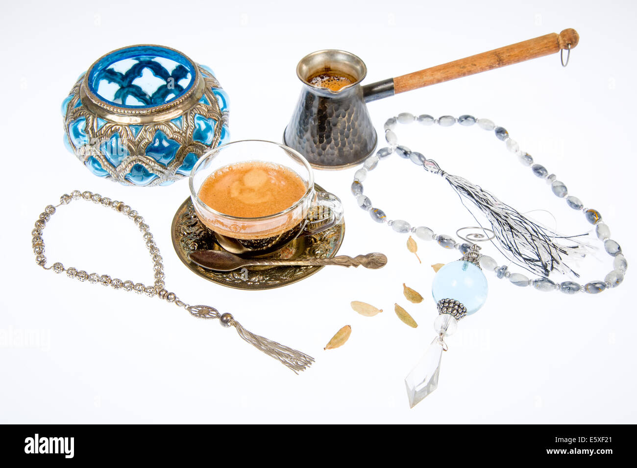 Arabic coffee with cardamom on a white background Stock Photo - Alamy