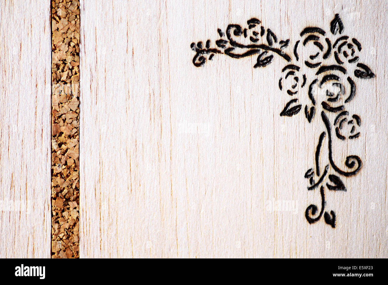 A a floral model made with pyrography on wood Stock Photo - Alamy