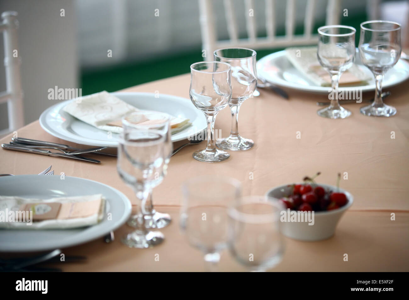 Shot with a dinner table in a restaurant Stock Photo - Alamy