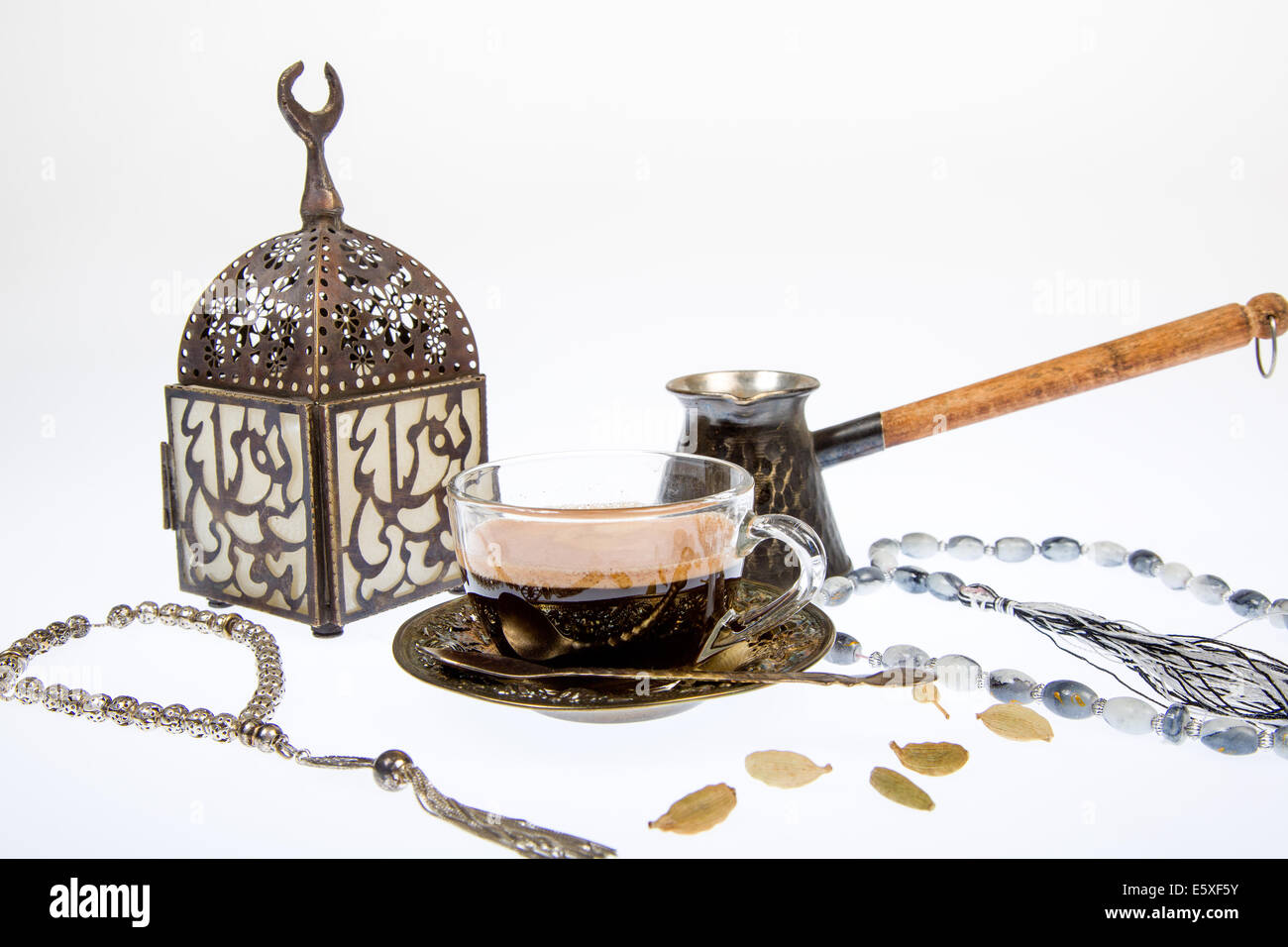 Arabic coffee with cardamom on a white background Stock Photo - Alamy