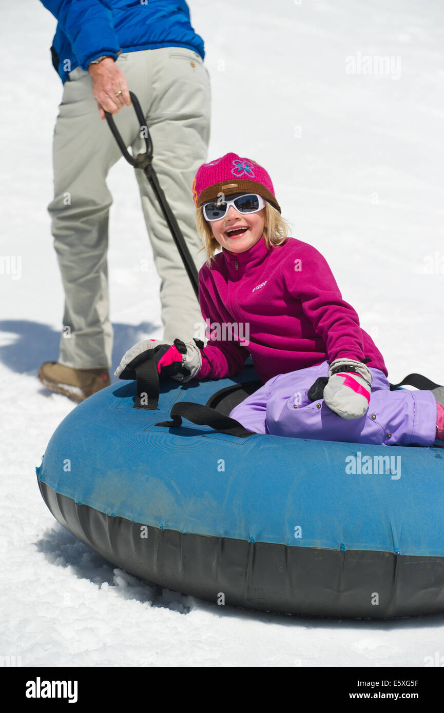 Lucy Weiss enjoys tubing at Snowbird Resort in Utah Stock Photo - Alamy