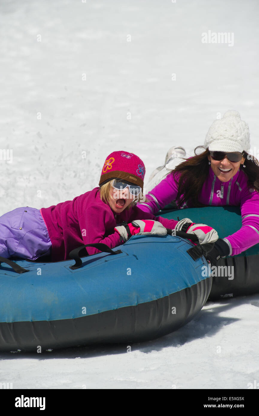 Suzanne and Lucy Weiss enjoy their time tubing at Snowbird Resort in ...