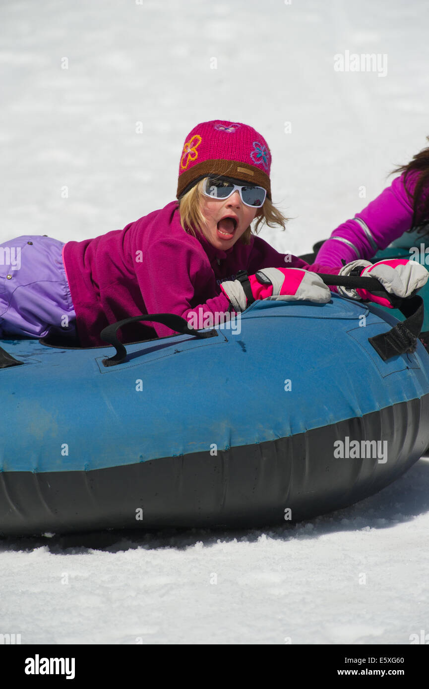 Suzanne and Lucy Weiss enjoy their time tubing at Snowbird Resort in ...