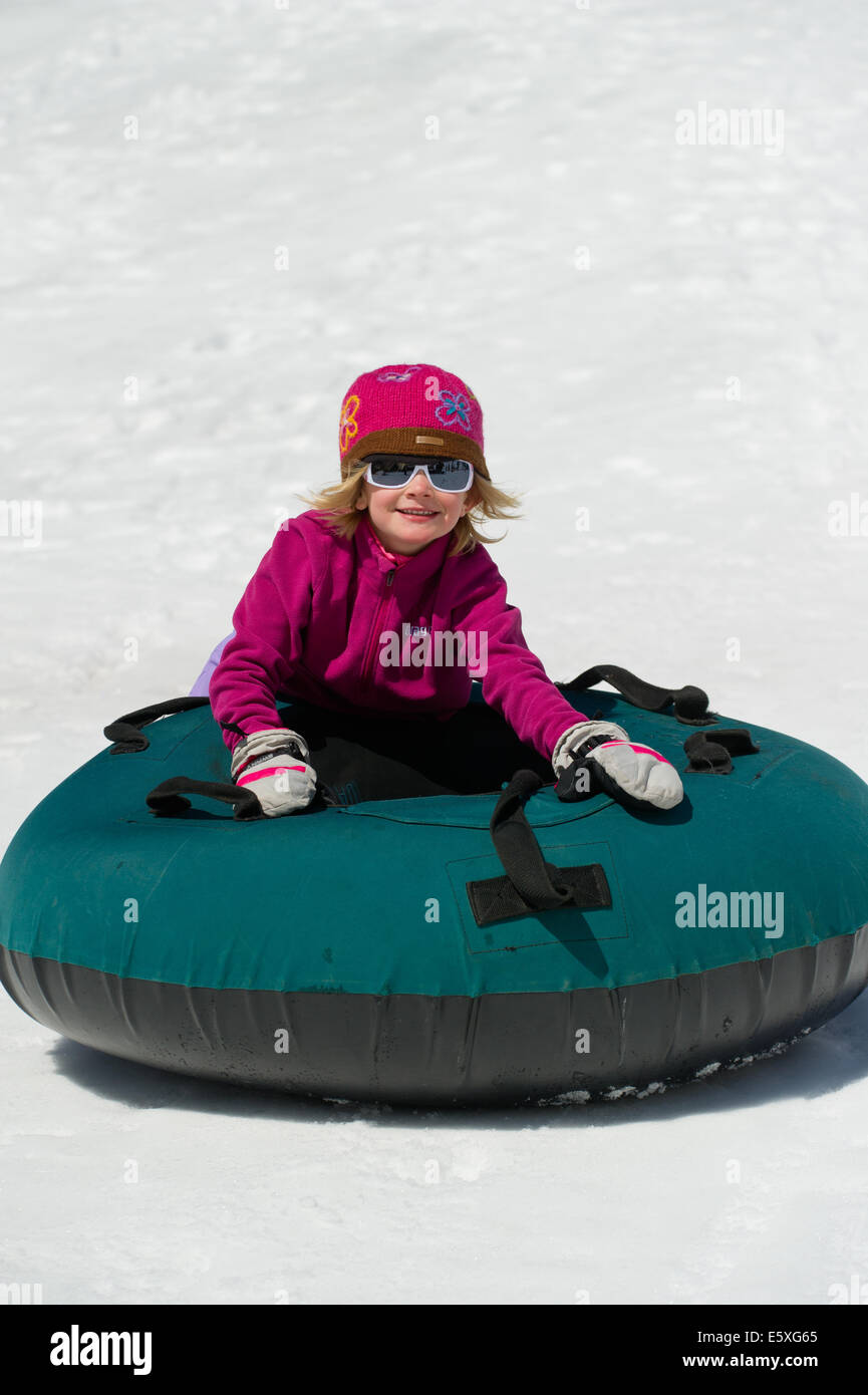 Lucy Weiss enjoys tubing at Snowbird Resort in Utah Stock Photo - Alamy