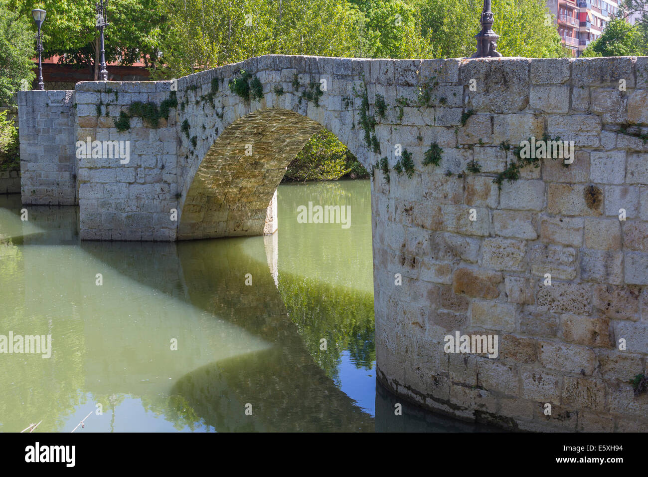 Old stone bridge block with arches and water Stock Photo - Alamy