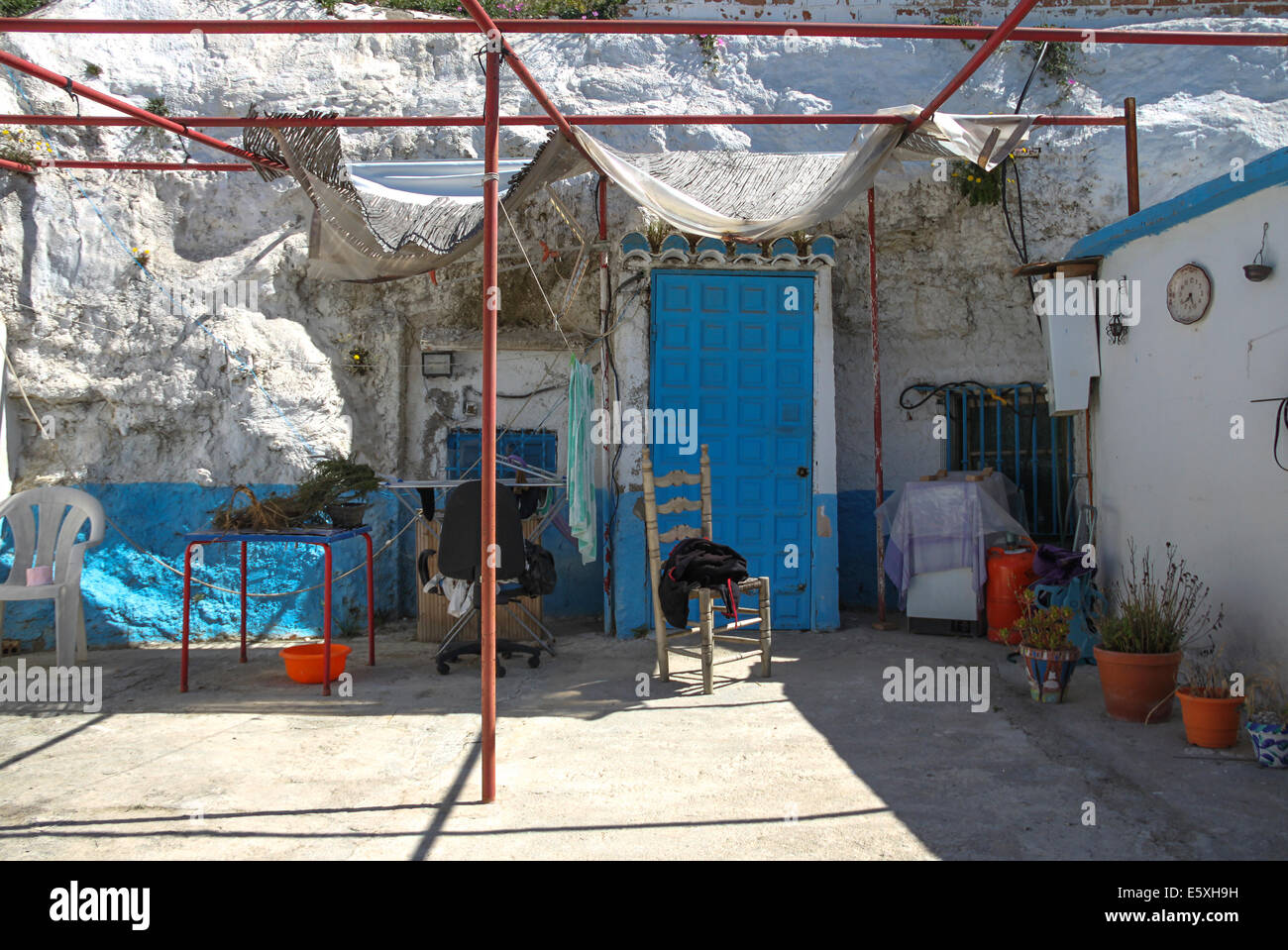 Typical entrance to a cave house in the city of Granada, Spain Stock ...