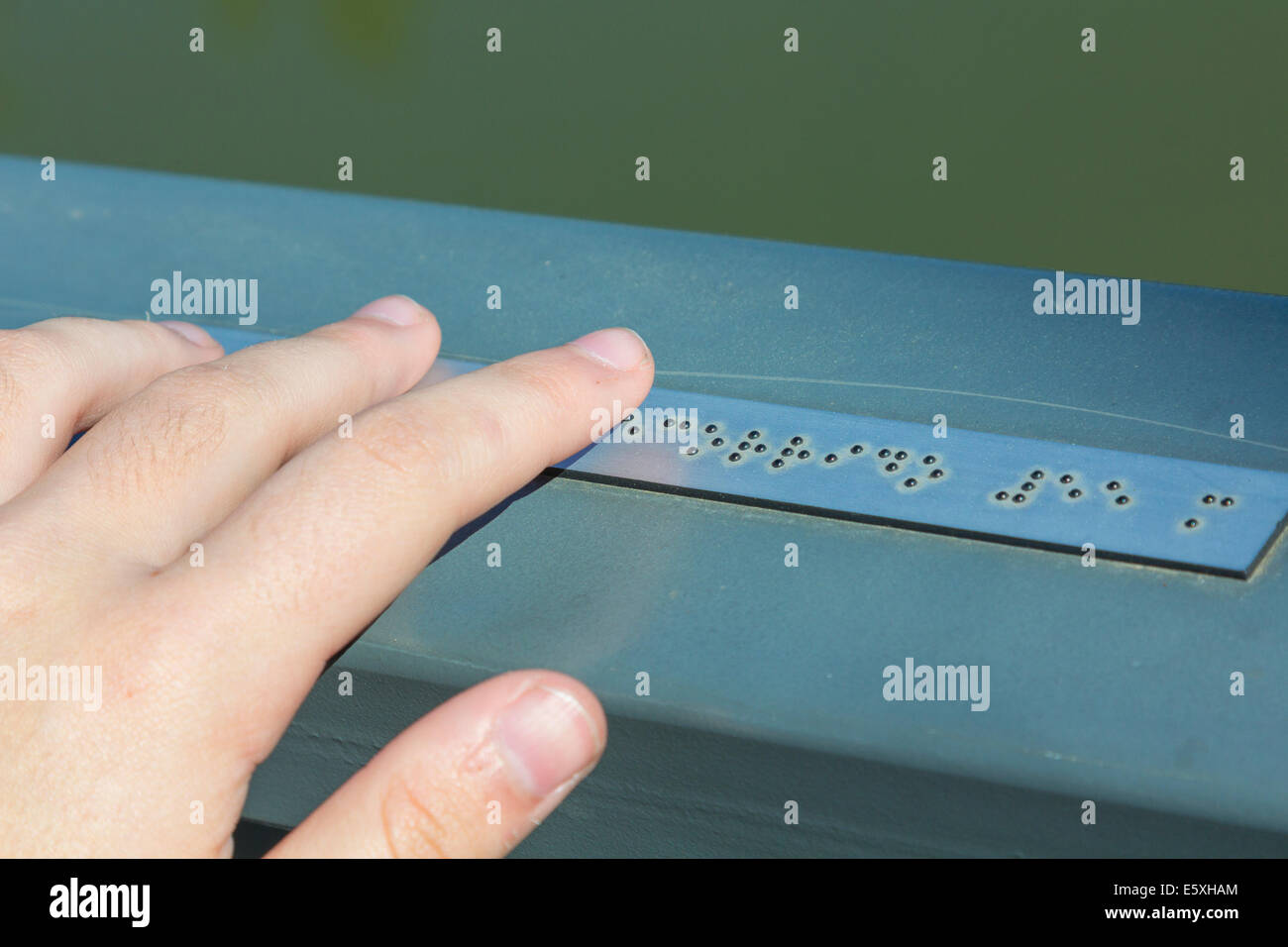 Young hand reading braille writing Stock Photo - Alamy