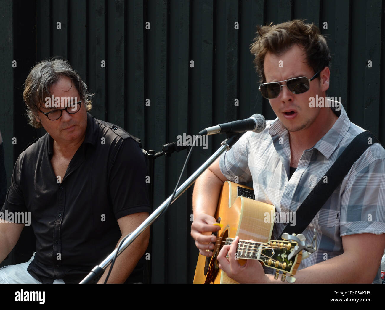Dylan Guthro and Bruce Guthro performing at a concert in Nova Scotia ...