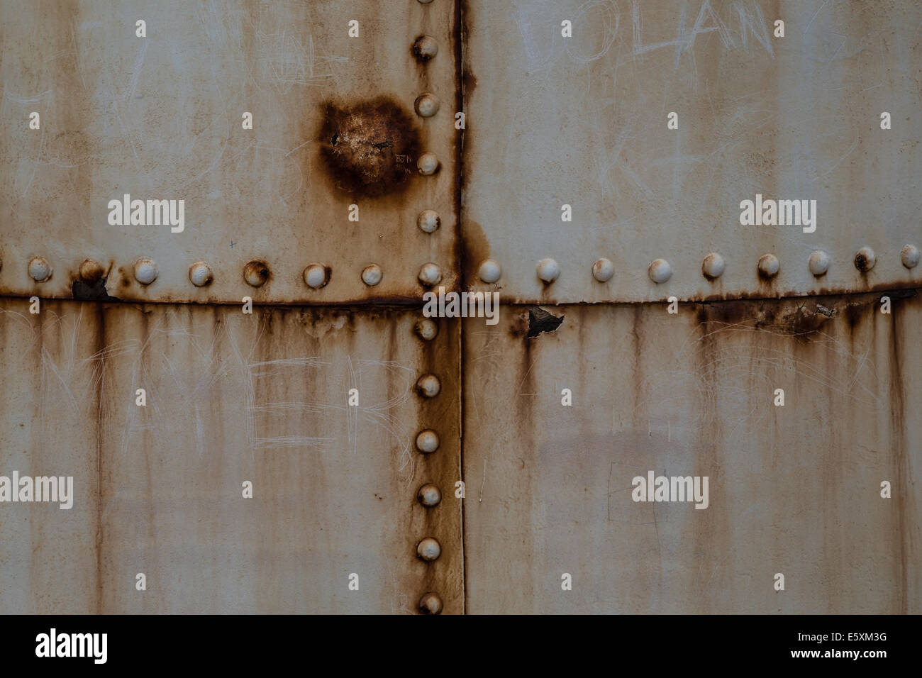 Rusty Metal joined by rivets Stock Photo - Alamy