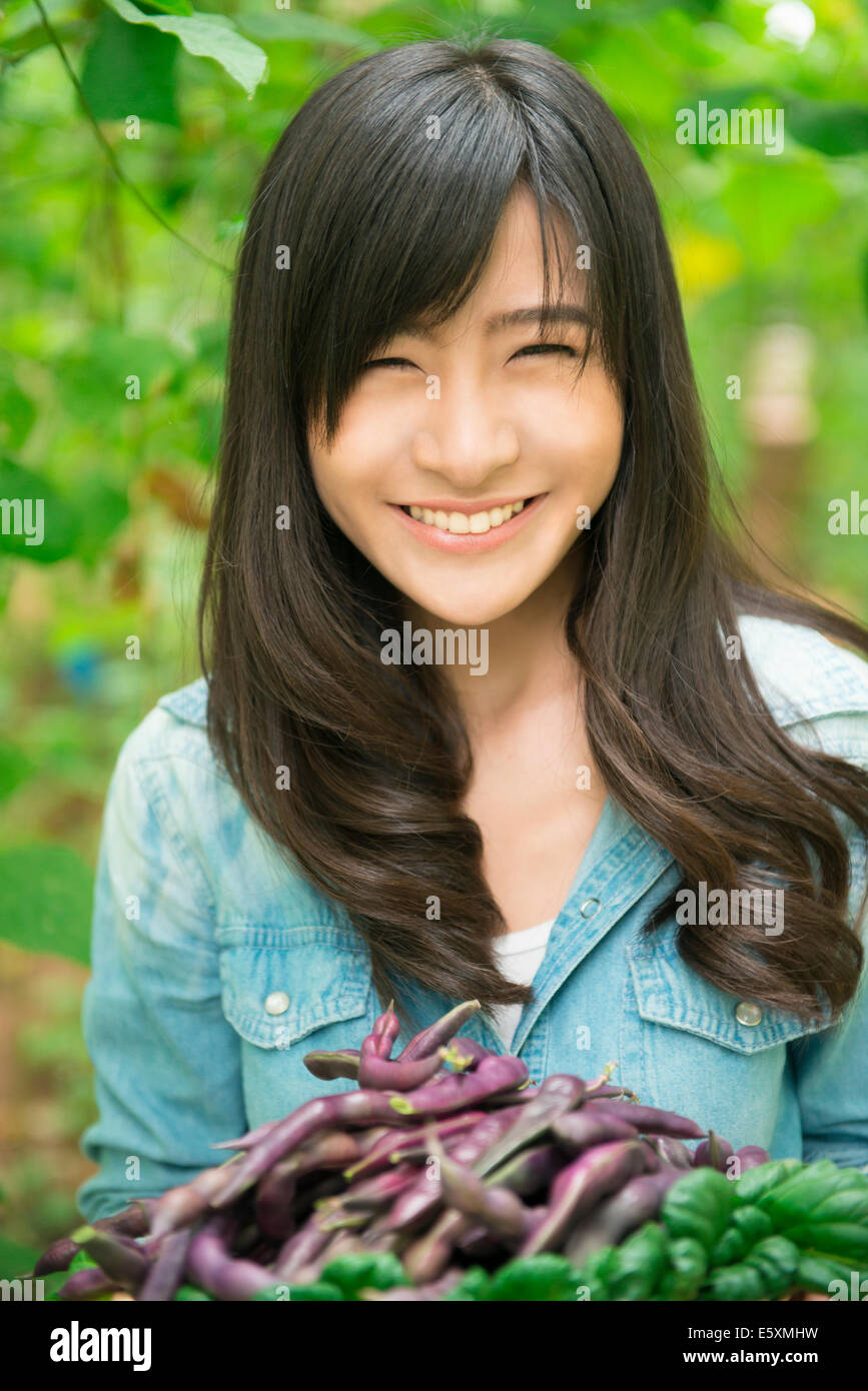 Woman holding vegetables hi-res stock photography and images - Alamy