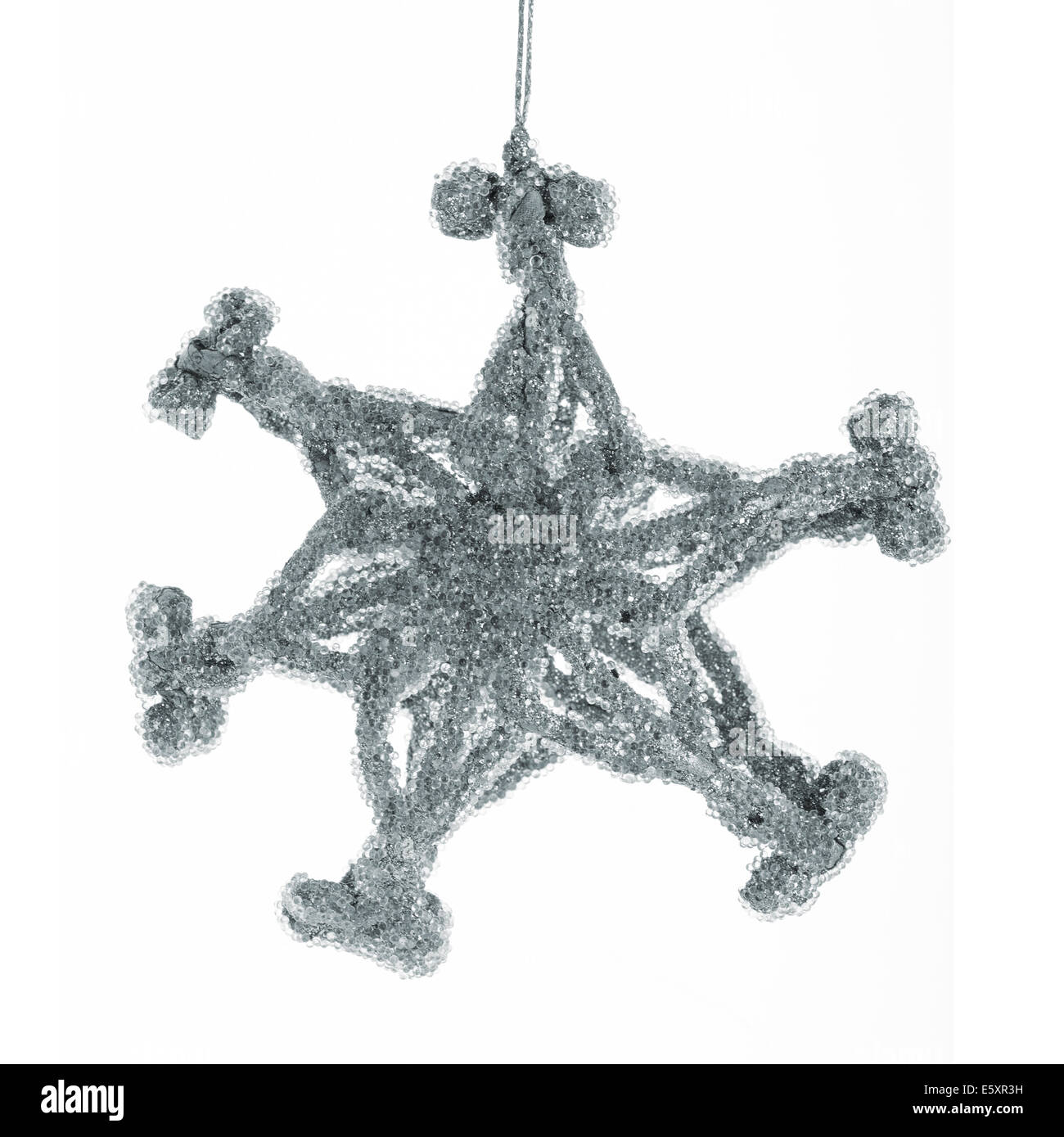 A silver star to decorate a Christmas tree Stock Photo - Alamy