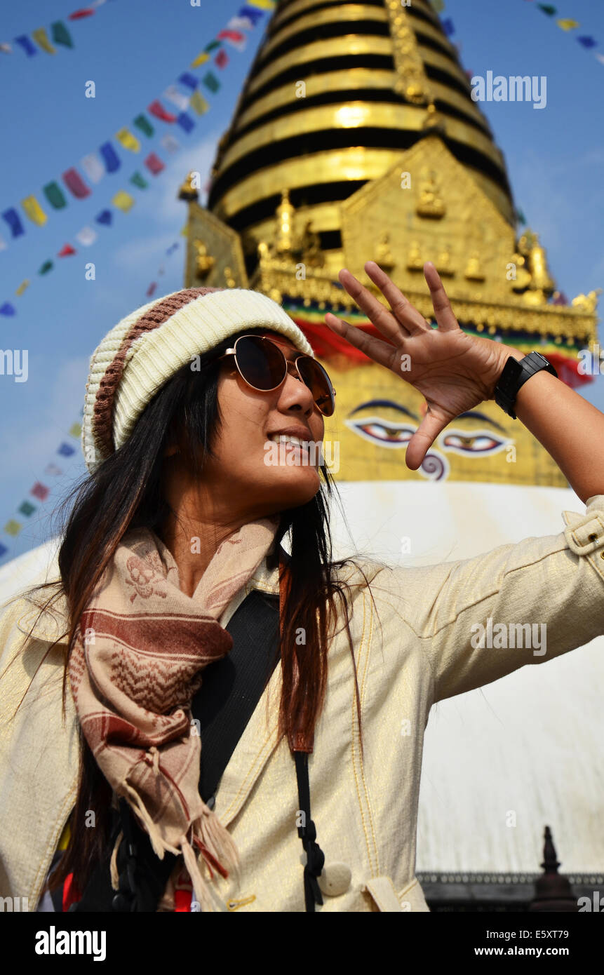 Thai women in Swayambhunath Temple or Monkey Temple with Buddha eyes or ...