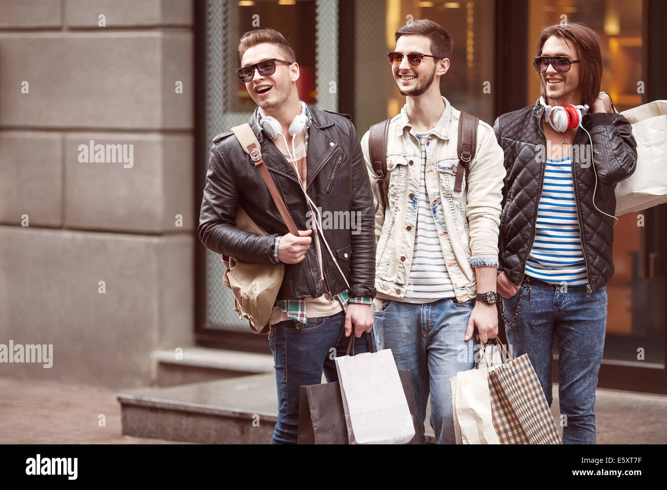 Three Young male fashion metraseksualy shop shopping walk Stock Photo ...