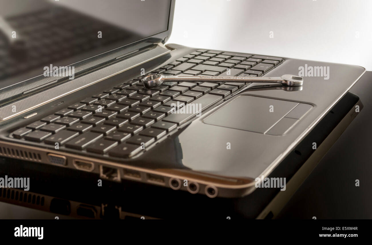 Open black laptop or notebook on white background Stock Photo - Alamy