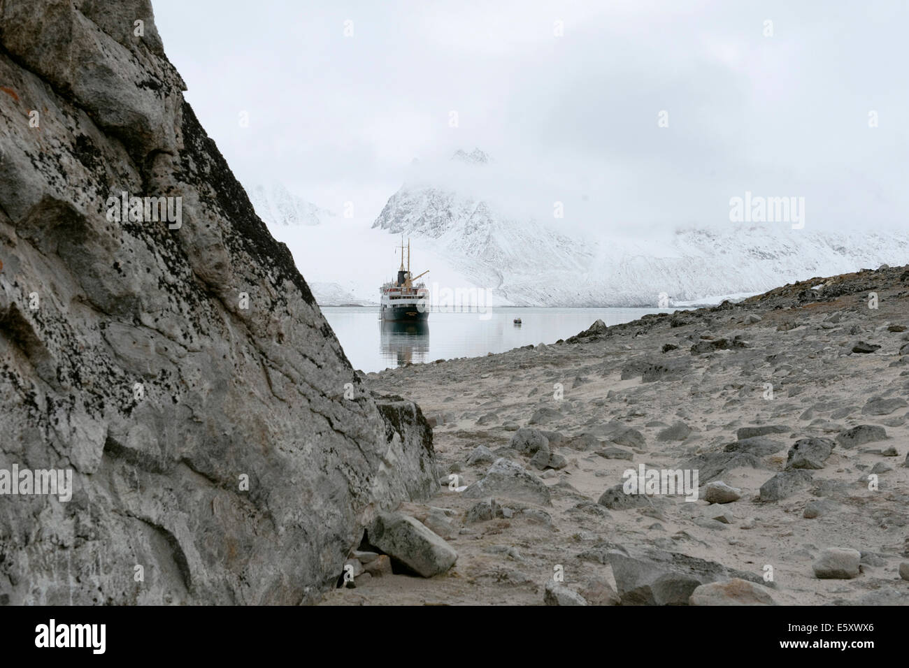 Rock framed ship in the cold fjord, 22 August 2012 Stock Photo - Alamy