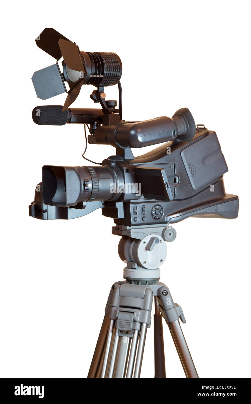 professional video camera on a tripod isolated on white background ...