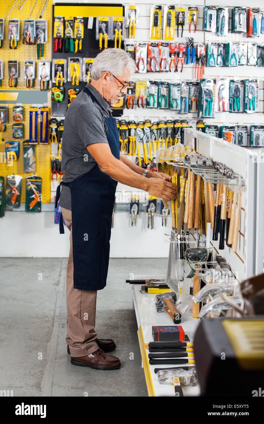 Salesman Working In Hardware Store Stock Photo - Alamy
