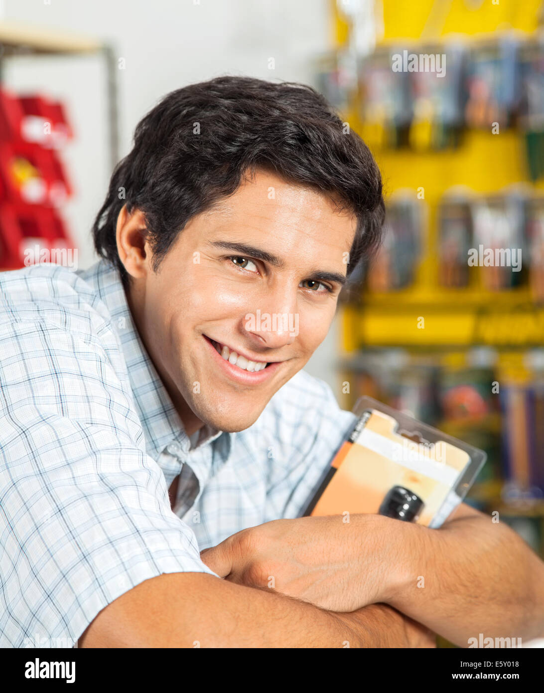 Man Smiling In Hardware Store Stock Photo - Alamy