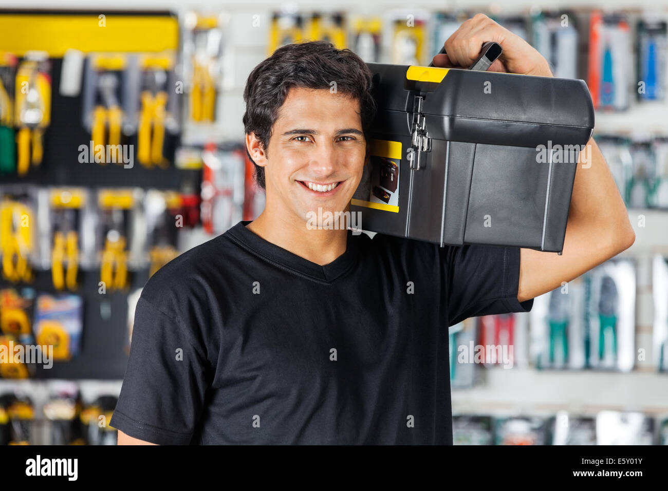 Man carrying tool box on hi-res stock photography and images - Alamy