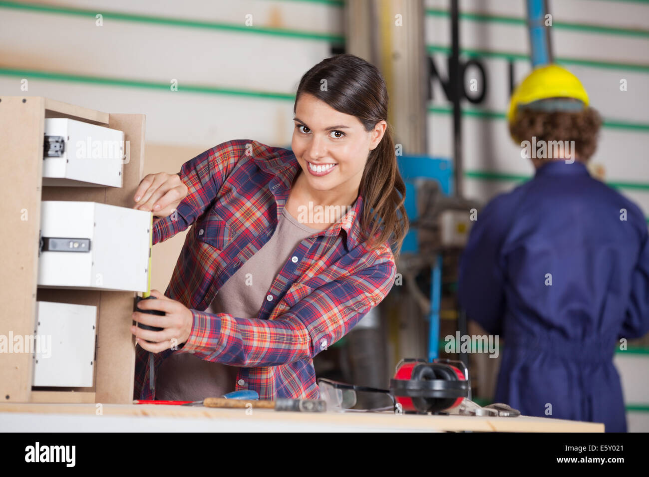 Carpenter Marking On Wood With Pencil Stock Photo - Alamy