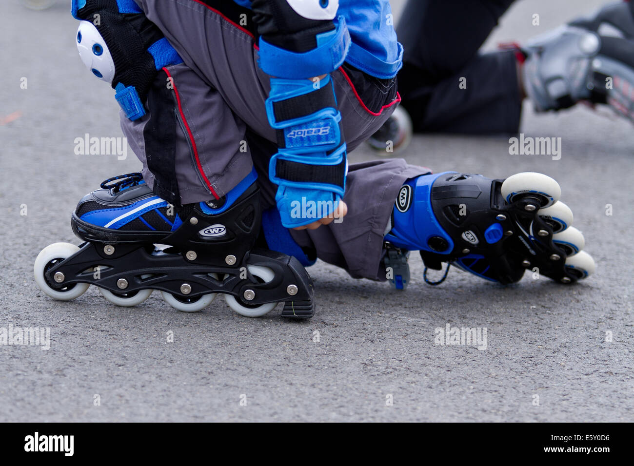 little boy practising in-line skating Stock Photo - Alamy