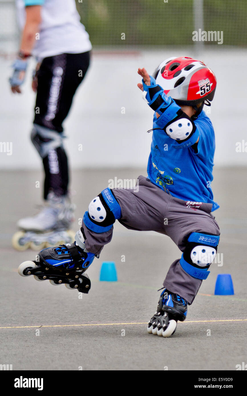 little boy practising in-line skating Stock Photo - Alamy
