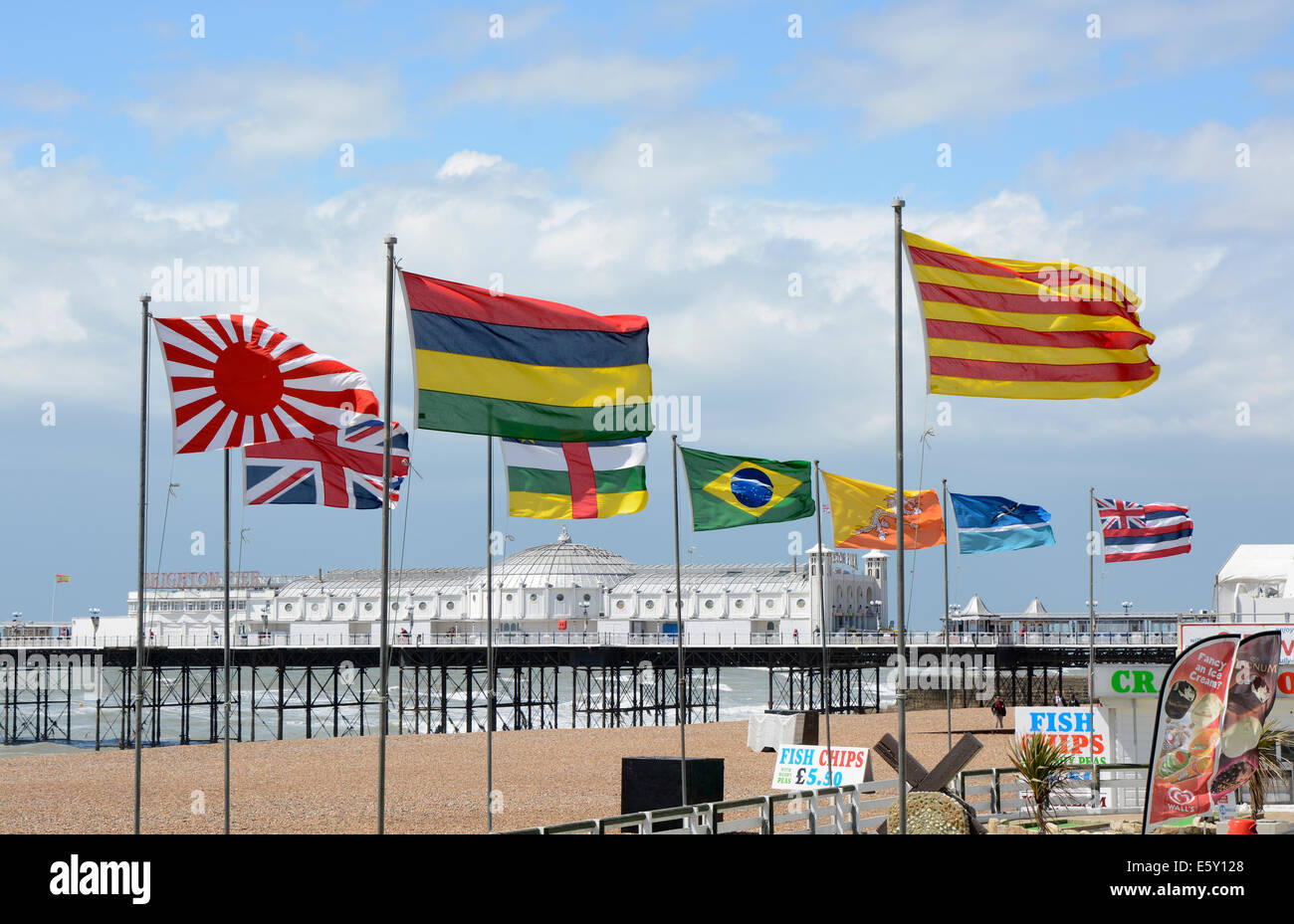 Assorted flags at Crazy Golf course on seafront at Brighton. East ...