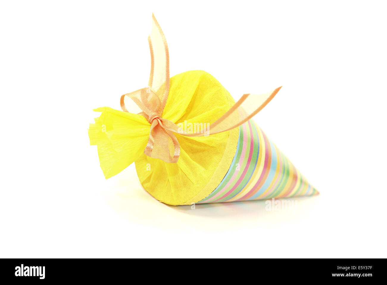 colorful school cone with ribbon on a bright background Stock Photo - Alamy