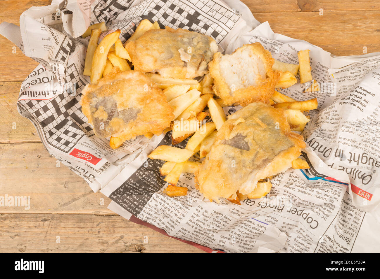 Fish and chips on their traditional newspaper wrap Stock Photo - Alamy
