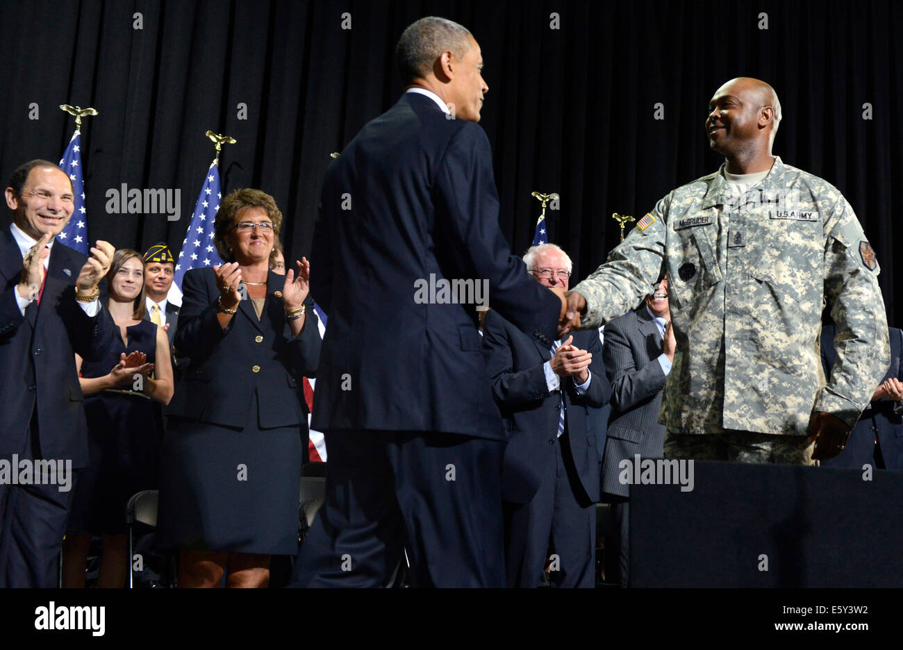 United States President Barack Obama (C) shakes hands with US Army Sgt ...