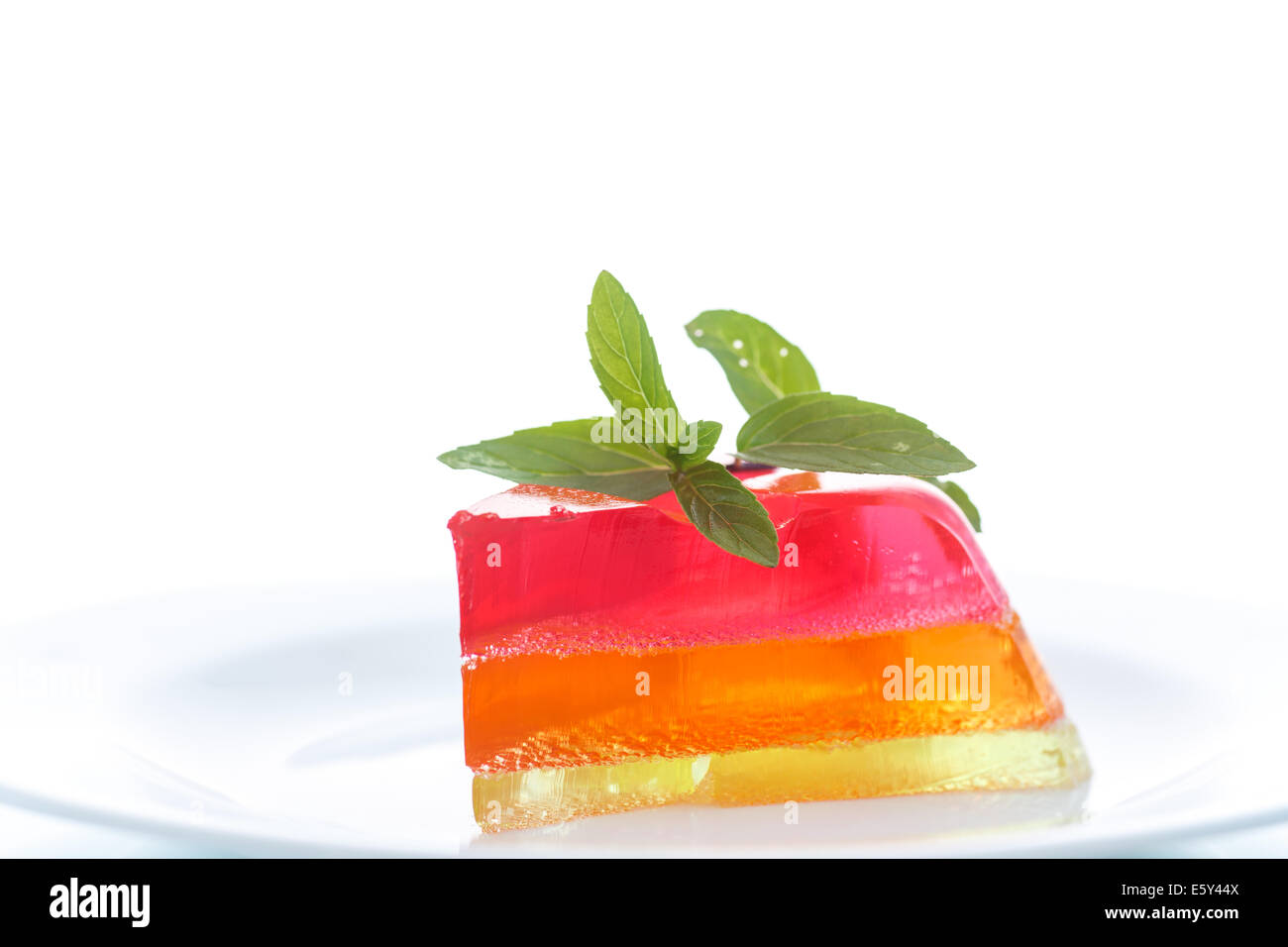 multi-layered fruit jelly isolated on white background Stock Photo - Alamy