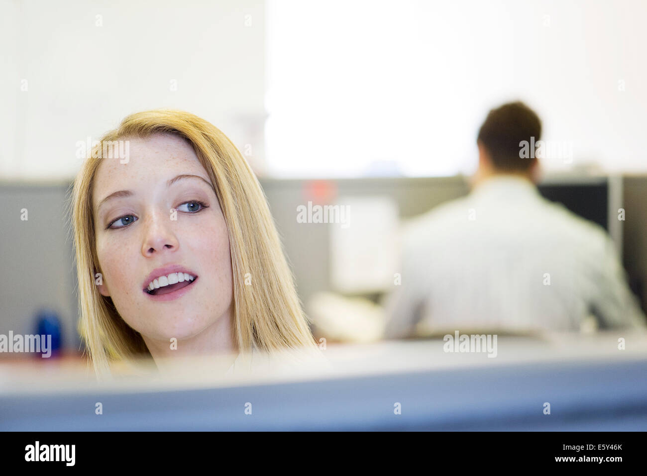 Office peering over cubicle wall hi-res stock photography and images - Alamy