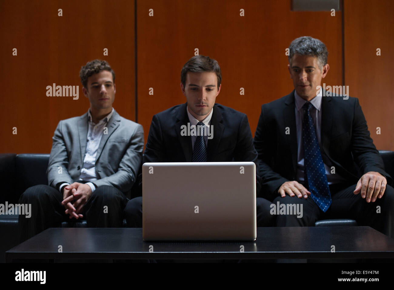 Business associates sitting side side hi-res stock photography and ... Business associates sitting side side hi-res stock photography and ...