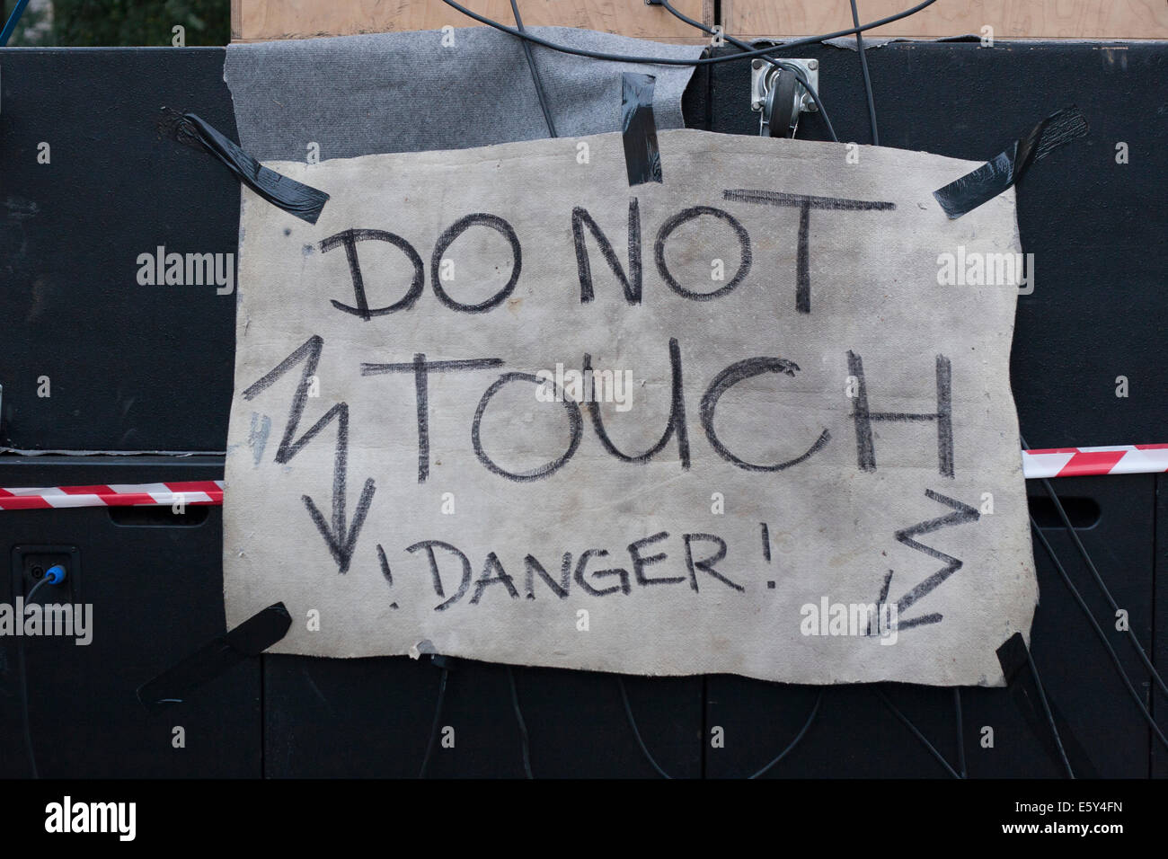 Hand written "Do not touch / Danger" sign Stock Photo - Alamy