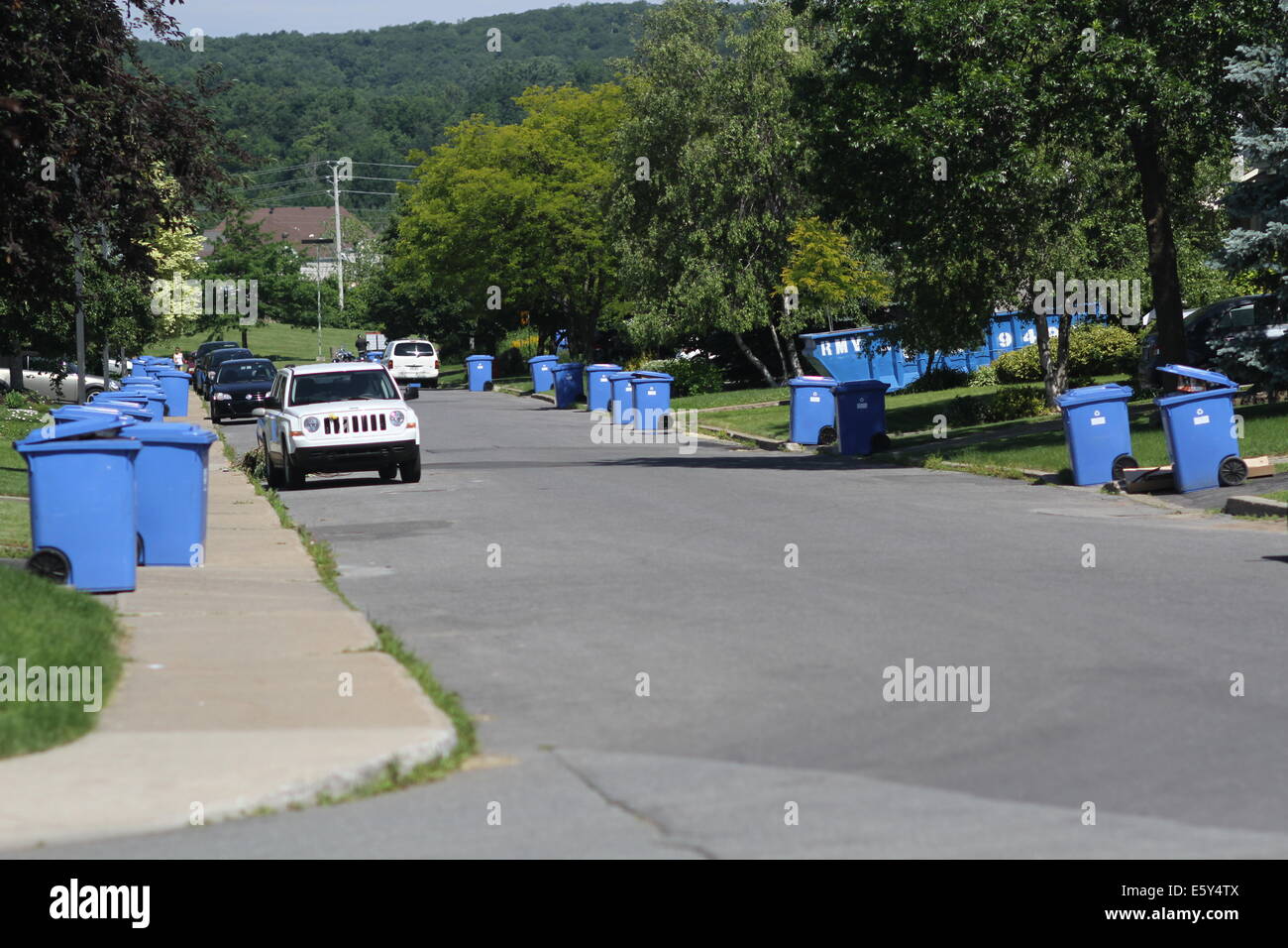 Recycling bins in a suburban Quebec neighborhood Stock Photo - Alamy