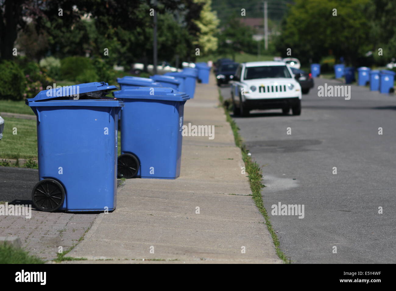 Recycling bins in a suburban Quebec neighborhood Stock Photo - Alamy