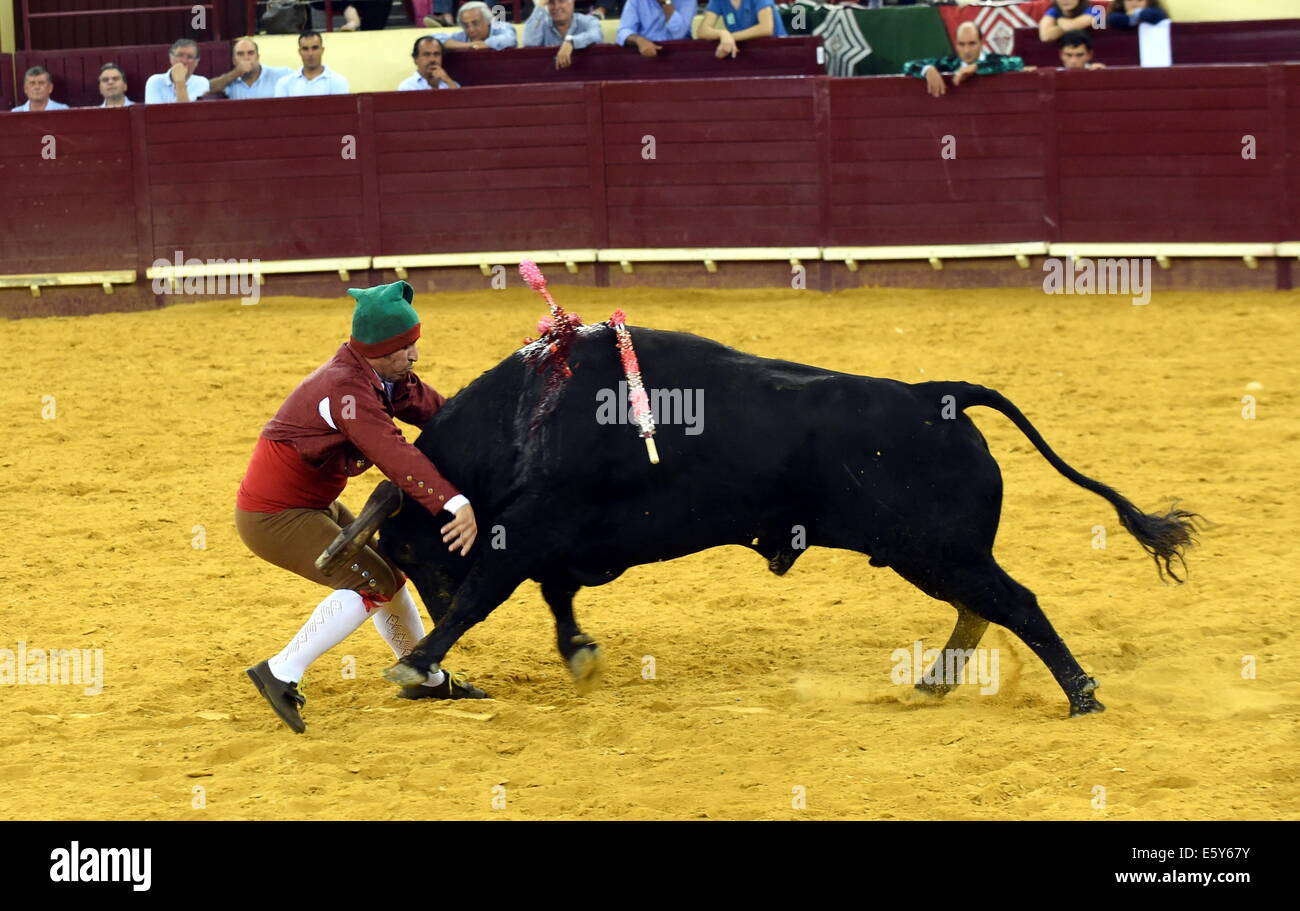 Lisbon, Portugal. 7th Aug, 2014. A man performs during a traditional ...