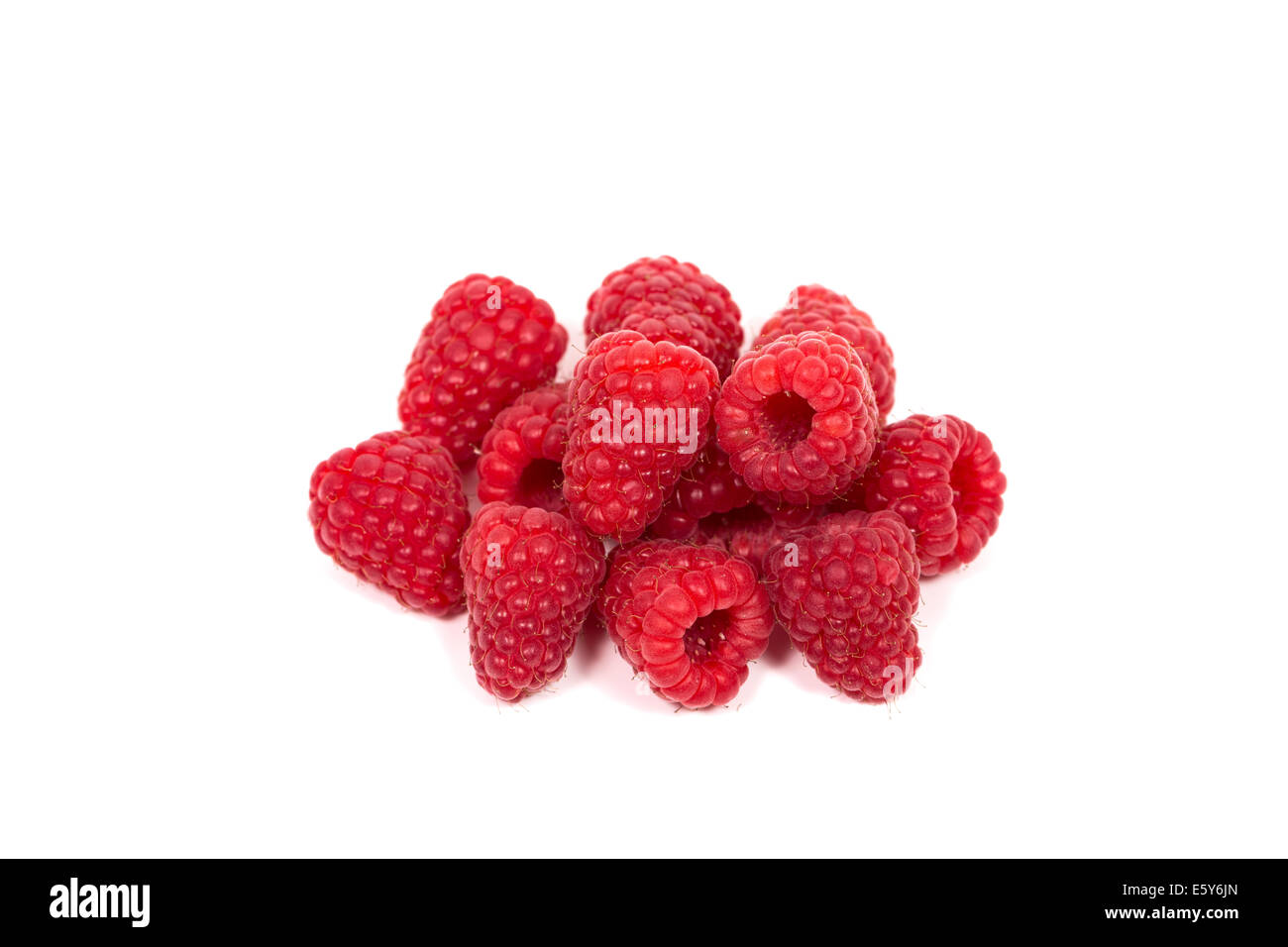 ripe red raspberry isolated on white background Stock Photo - Alamy