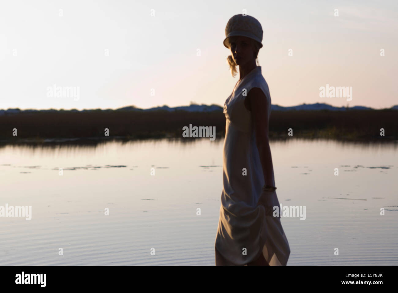 Woman wearing dress in water hi-res stock photography and images - Alamy
