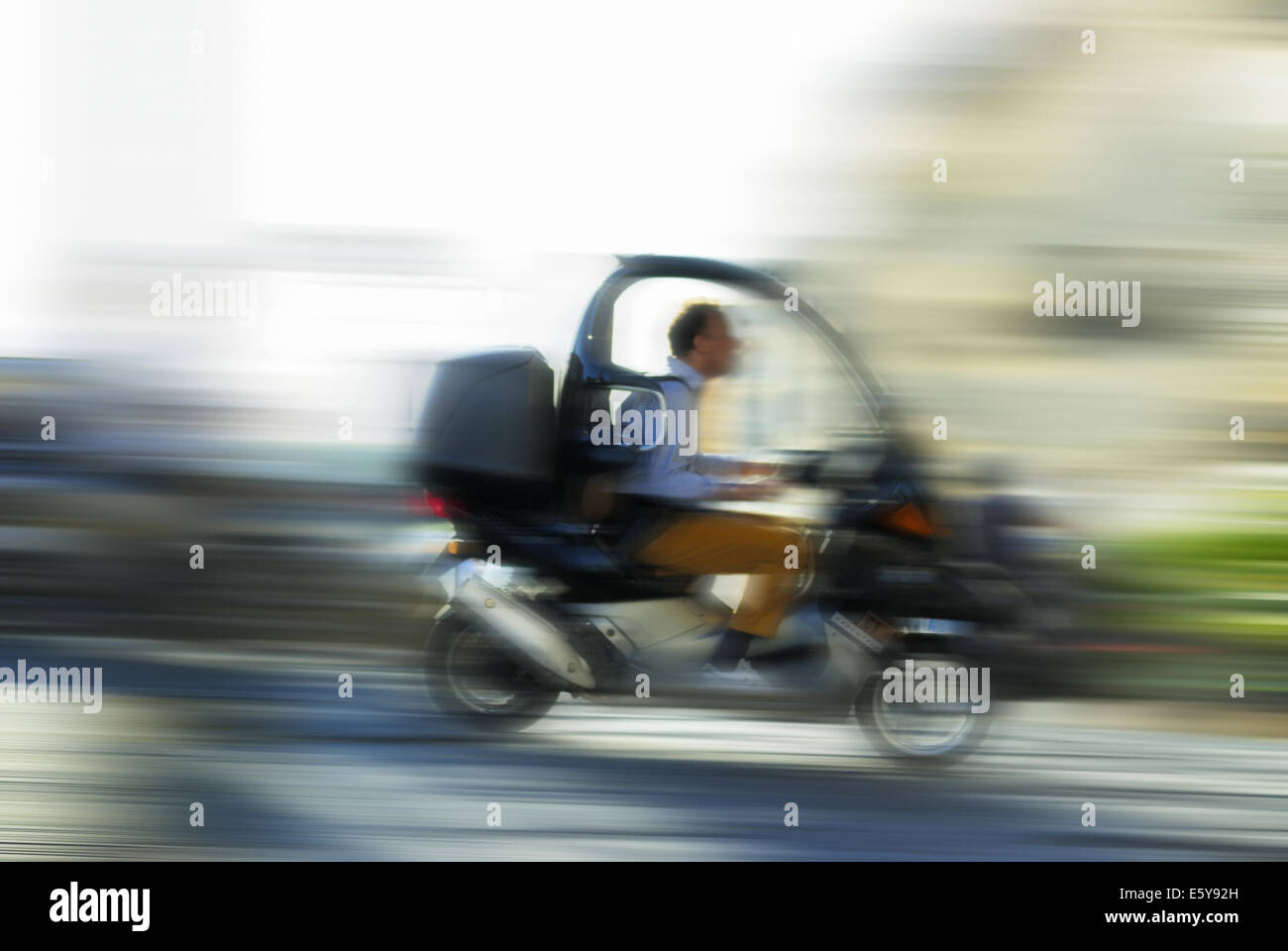 speeding moped with roof, Florence, Italy Stock Photo - Alamy