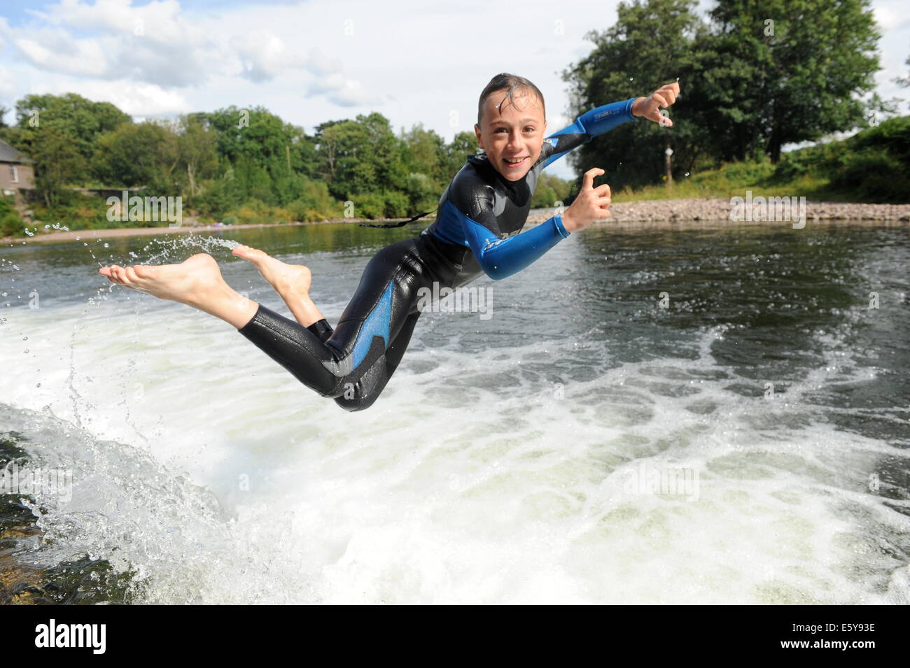 Child jumping river uk hi-res stock photography and images - Alamy