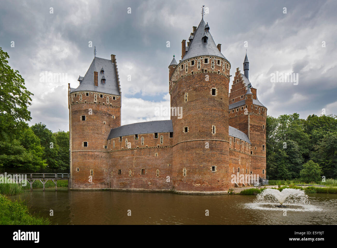 The medieval Beersel Castle surrounded by a moat, Flanders, Belgium ...