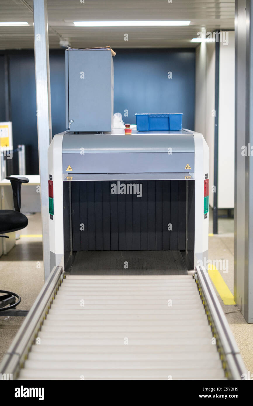 Detail shot of unmanned airport scanner belt Stock Photo - Alamy